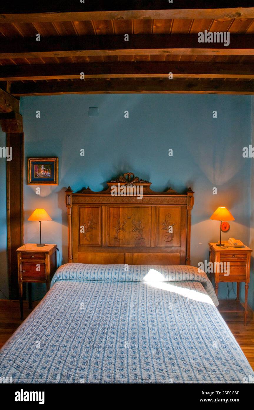 Bedroom in a rural hotel Stock Photo - Alamy