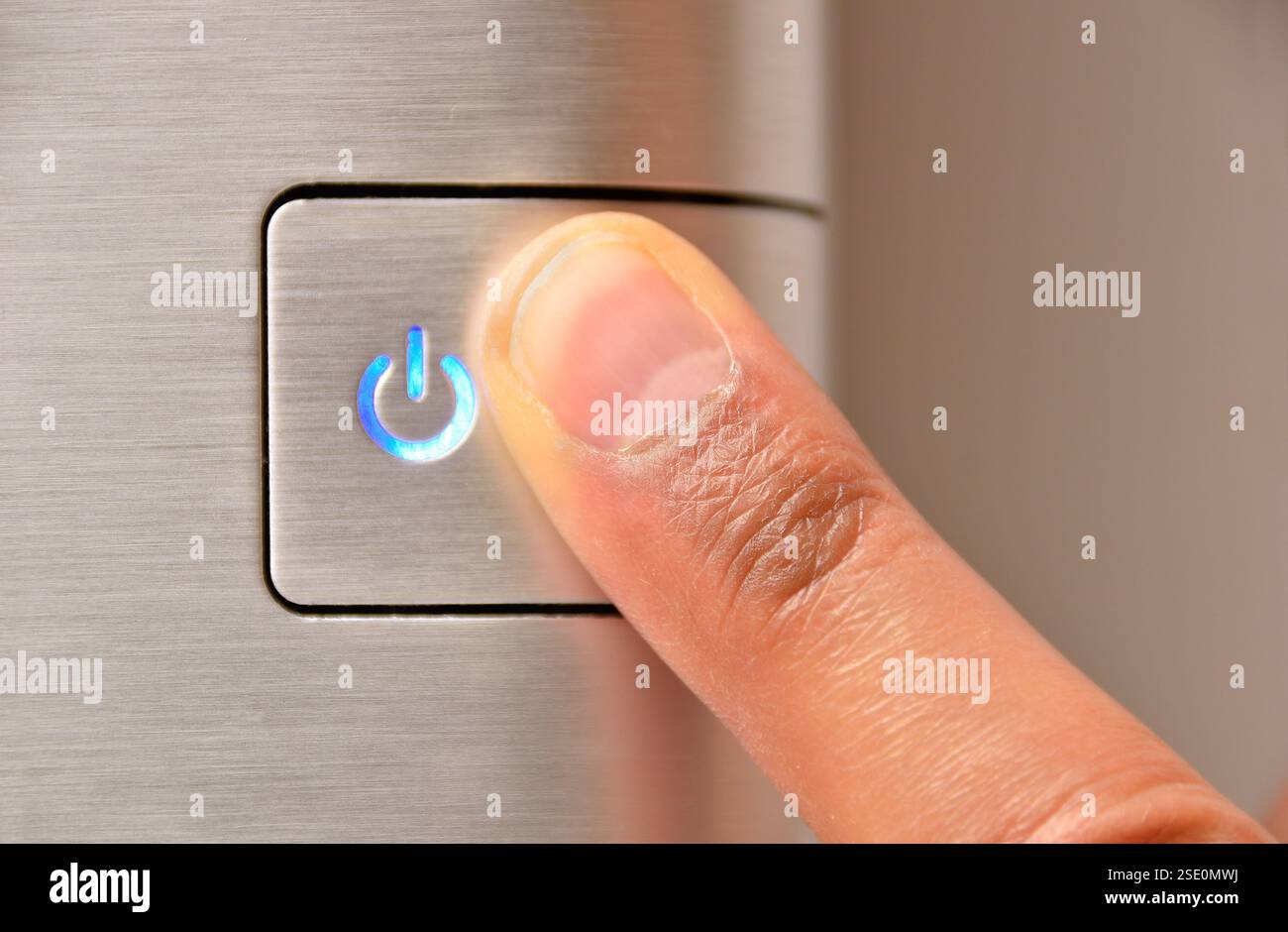 Finger on power button of computer hi-res stock photography and images ...
