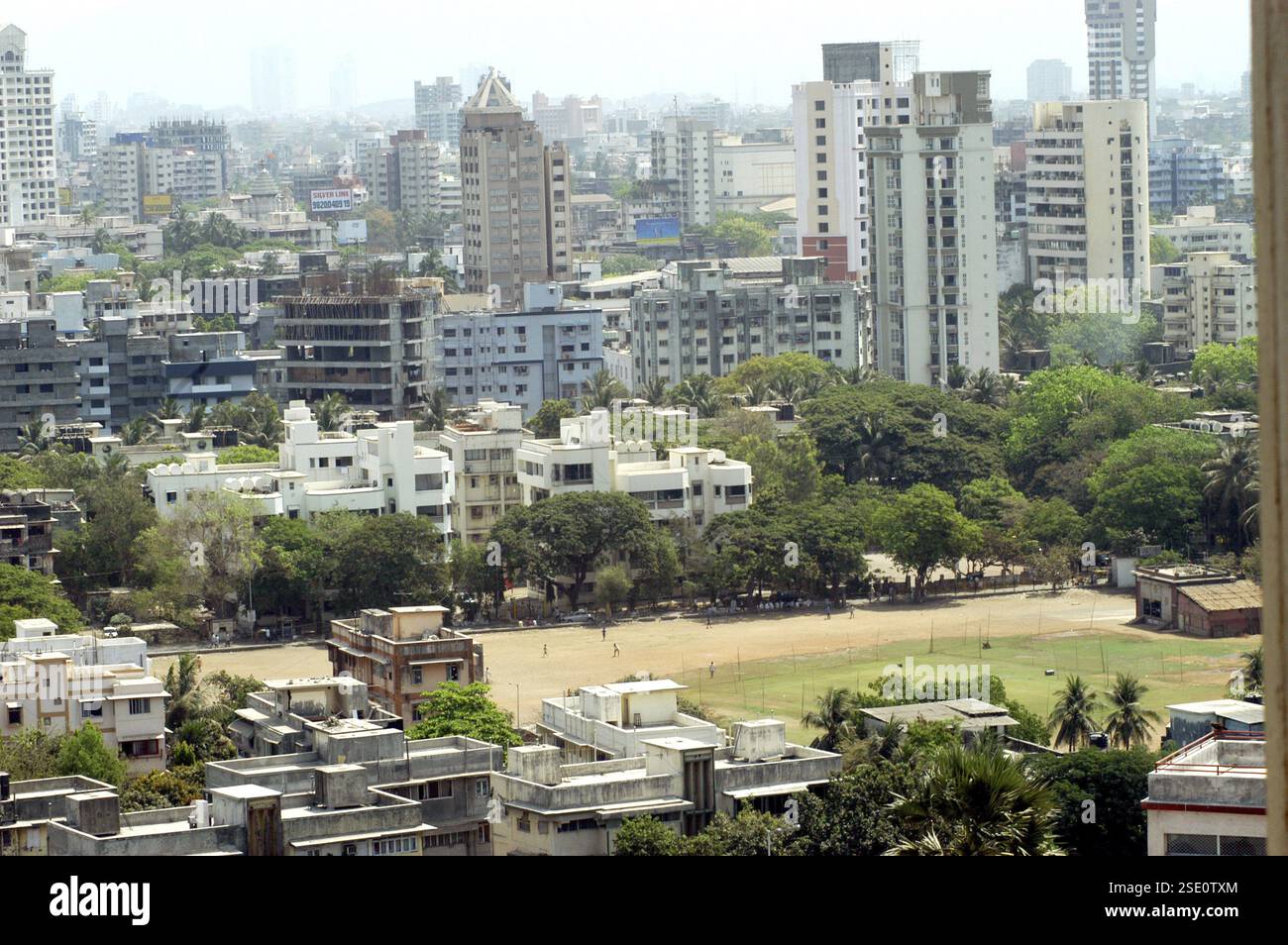 Aerial view of playground with tall multi storied buildings at Worli ...