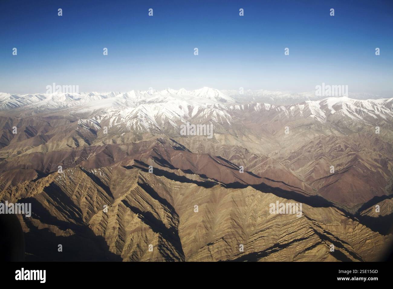 Aerial view of snow covered Himalayan mountains, Ladakh, Jammu and ...