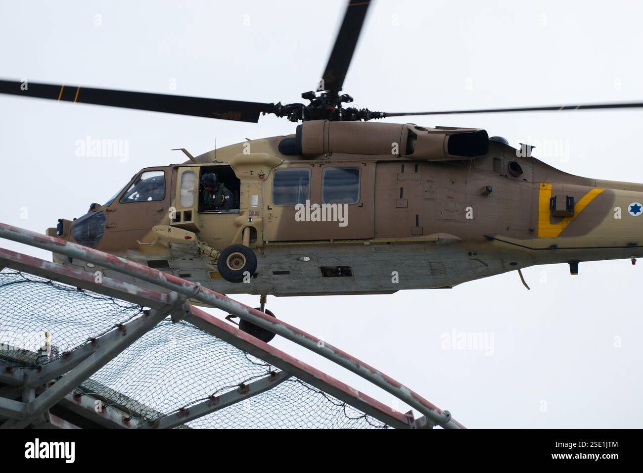 An Israeli military helicopter carrying Israel hostages arrives at ...