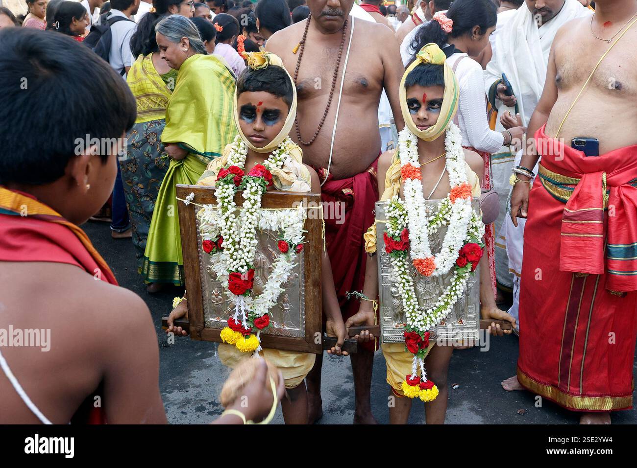 Two boys from the Devanga (weaver's caste) lead a procession to celebrate the goddess ...