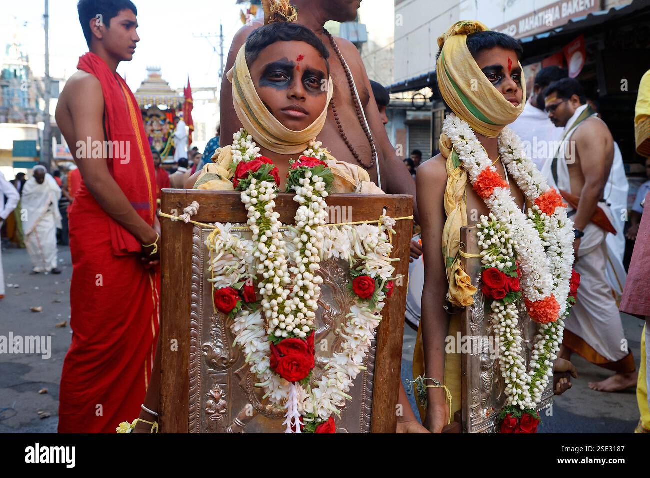Two boys from the Devanga (weaver's caste) lead a procession to ...