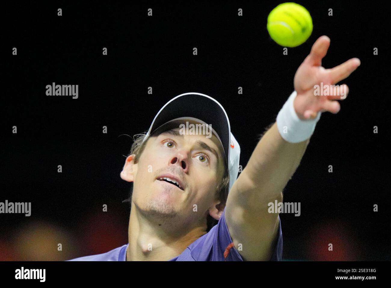 Australia's Alex de Minaur serves to Italy's Mattia Bellucci during the ...