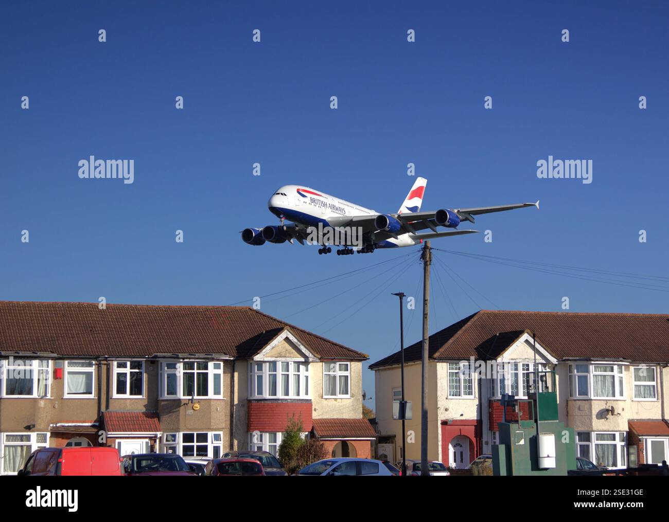 British Airways Airbus A380-841 G-XLEI flies low over houses on Myrtle ...