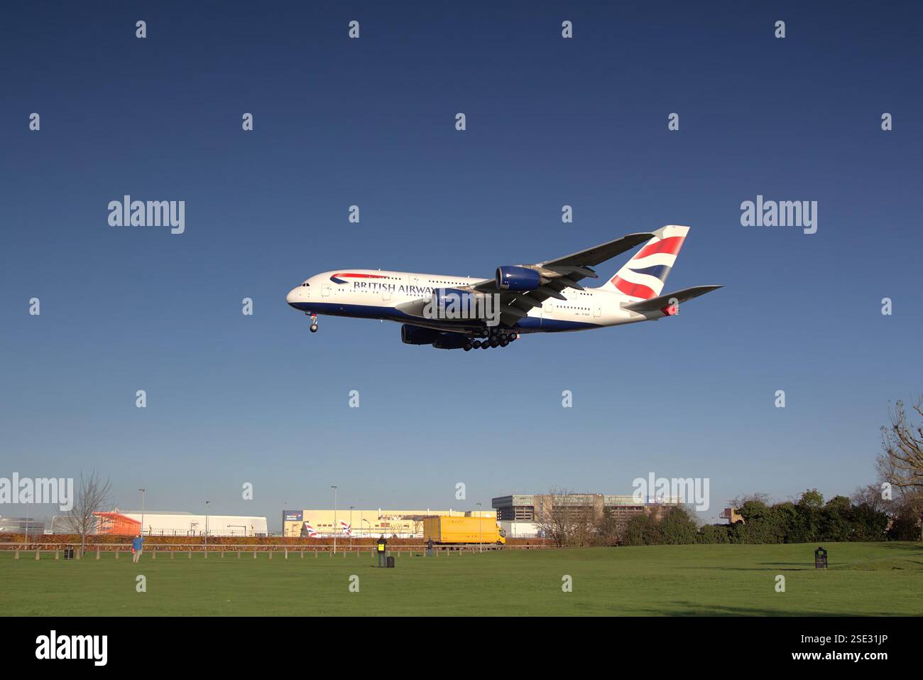 British Airways Airbus A380-841 G-XLEI flies low over Myrtle Avenue on ...