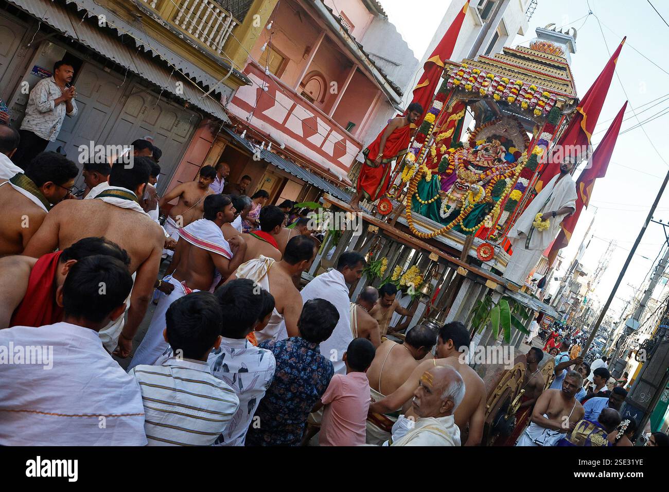A chariot with an image of the goddess Chowdeshwari being hauled by ...