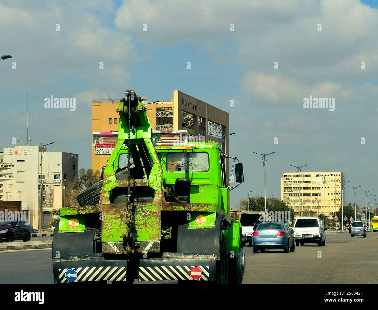 Cairo, Egypt, February 1 2025: A green tow truck, a wrecker, a ...