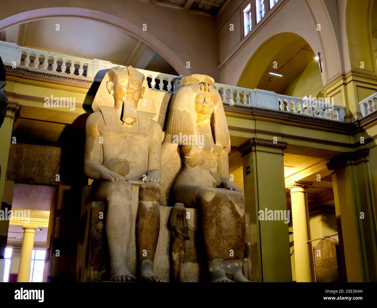 Cairo, Egypt, February 1 2025: Amenhotep III and Tiye Colossal Statue inside the Egyptian or ...