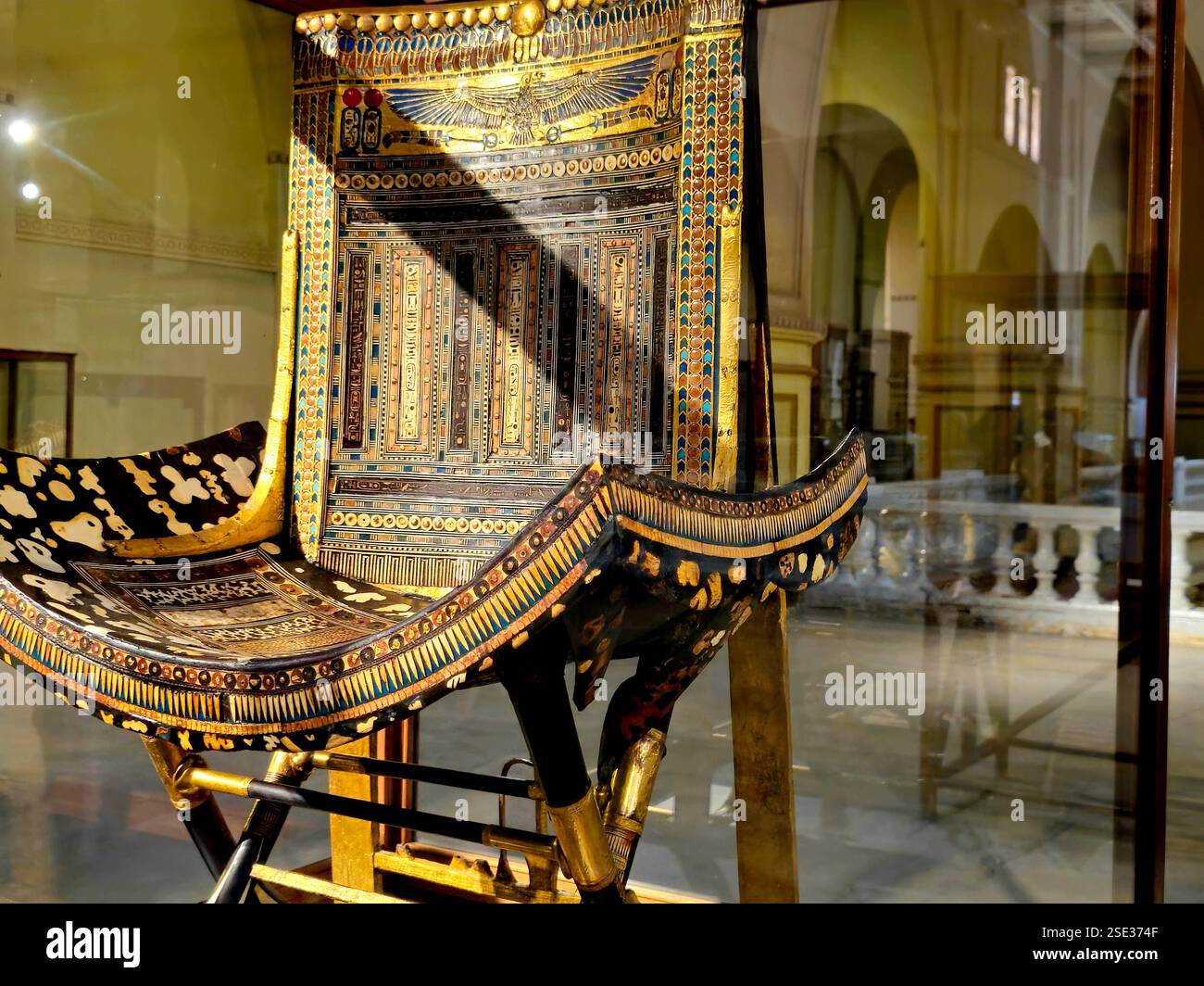 Cairo, Egypt, February 1 2025: King Tutankhamun chair throne inside the ...