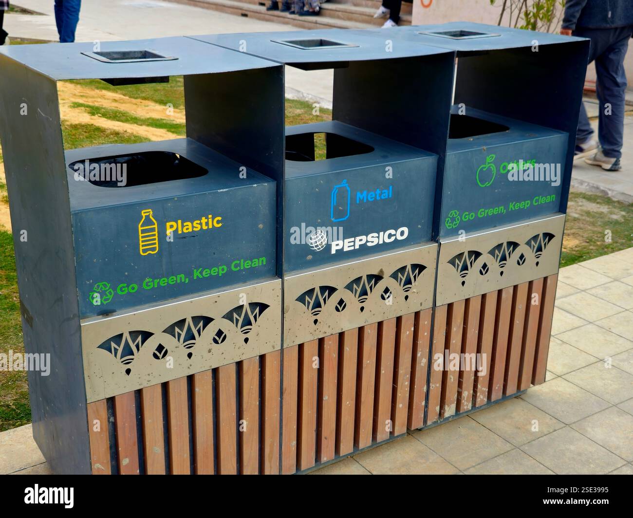 Cairo, Egypt, February 1 2025: Wooden trash bin for different garbage ...