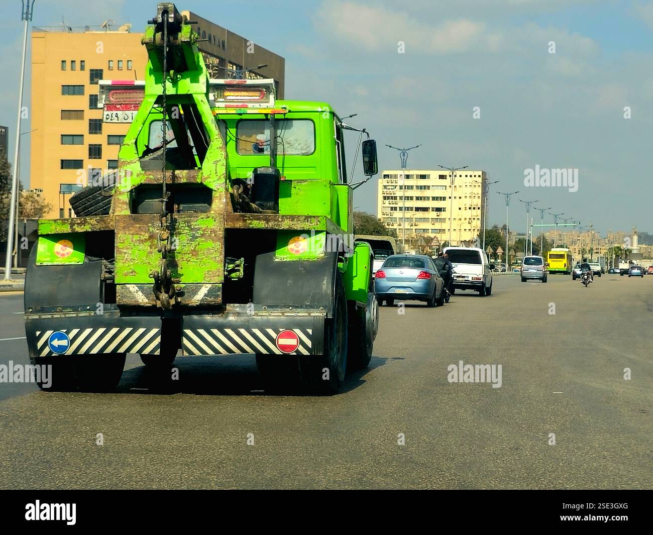 Cairo, Egypt, February 1 2025: A green tow truck, a wrecker, a ...