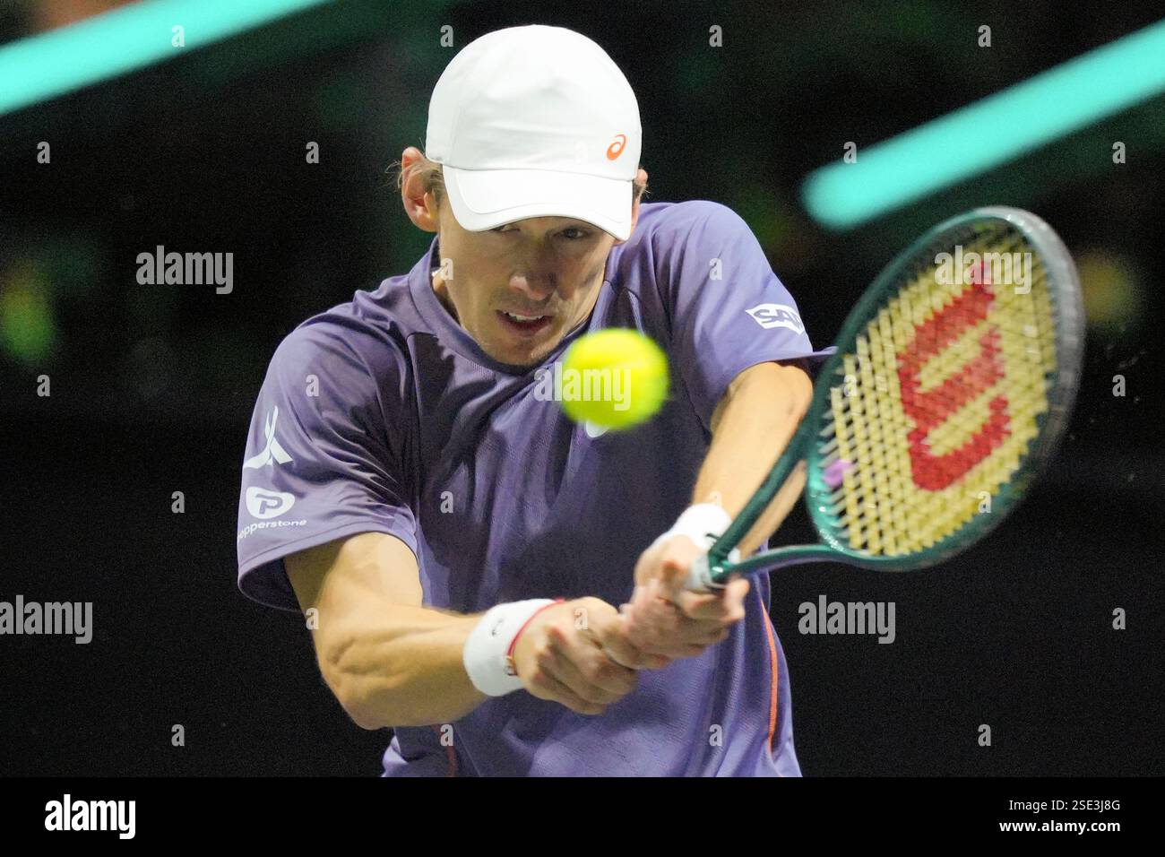 Australia's Alex de Minaur returns to Italy's Mattia Bellucci during ...