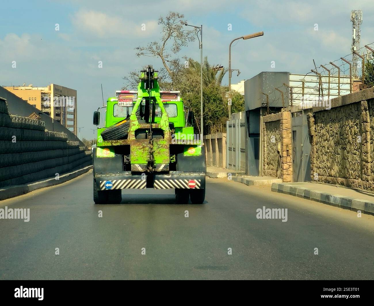 Cairo, Egypt, February 1 2025: A green tow truck, a wrecker, a ...