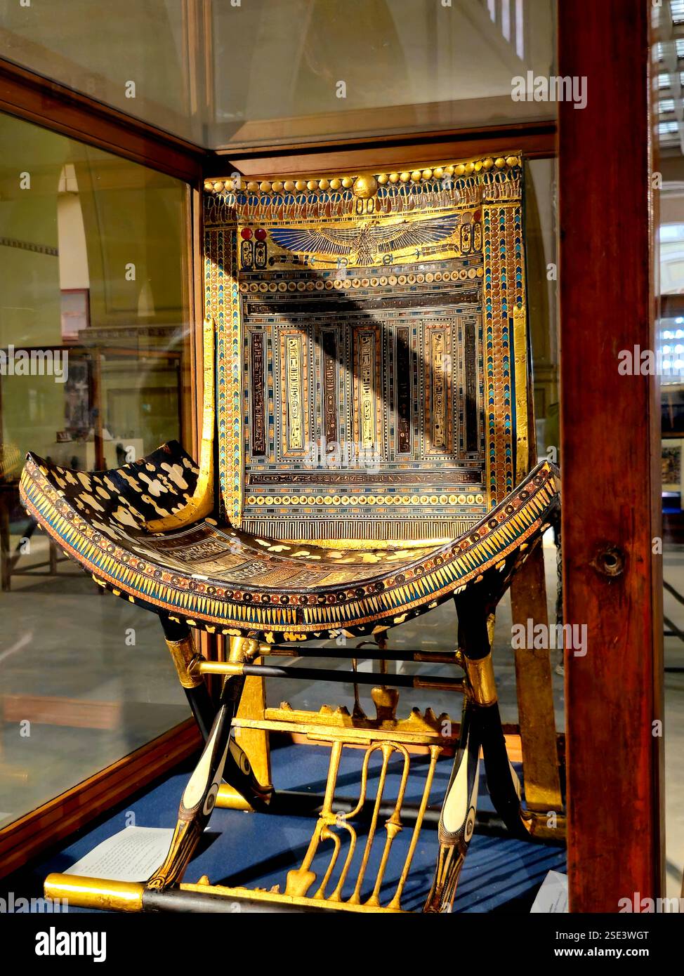 Cairo, Egypt, February 1 2025: King Tutankhamun chair throne inside the ...