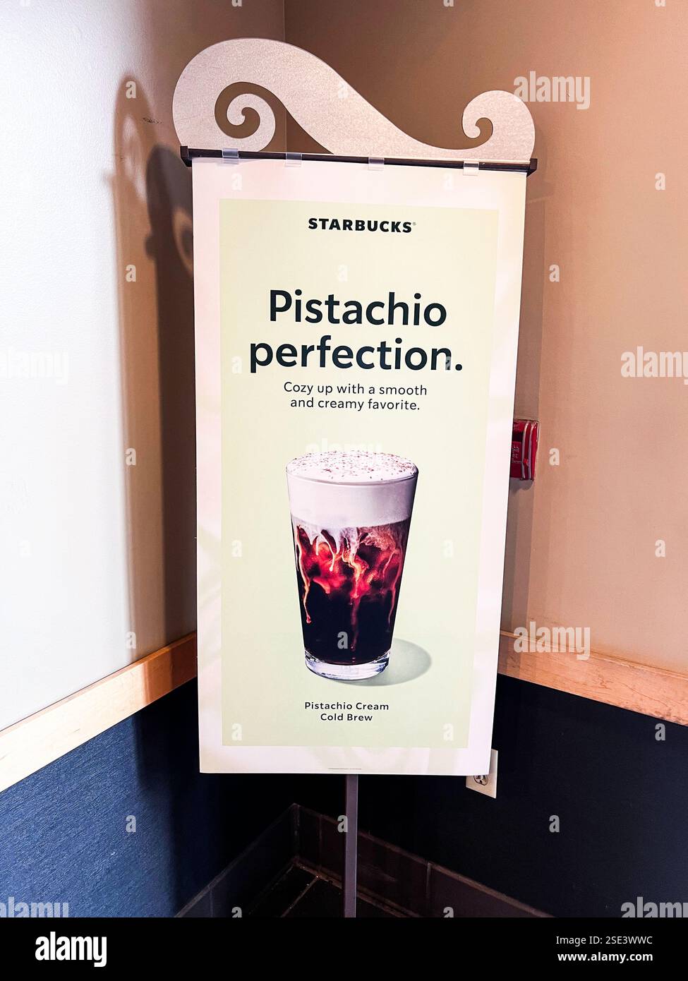 A sign promotes Pistachio Cream Cold Brew at a Starbucks location in ...