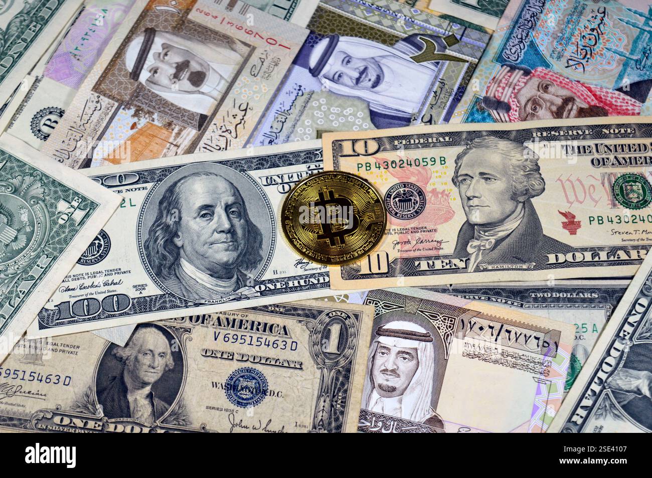 Bitcoin physical golden coin BTC, American money dollars banknotes USD ...