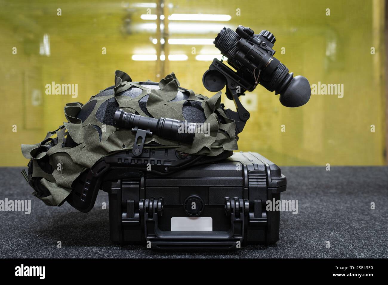 Modern night vision monocular mounted on the tactical military helmet ...