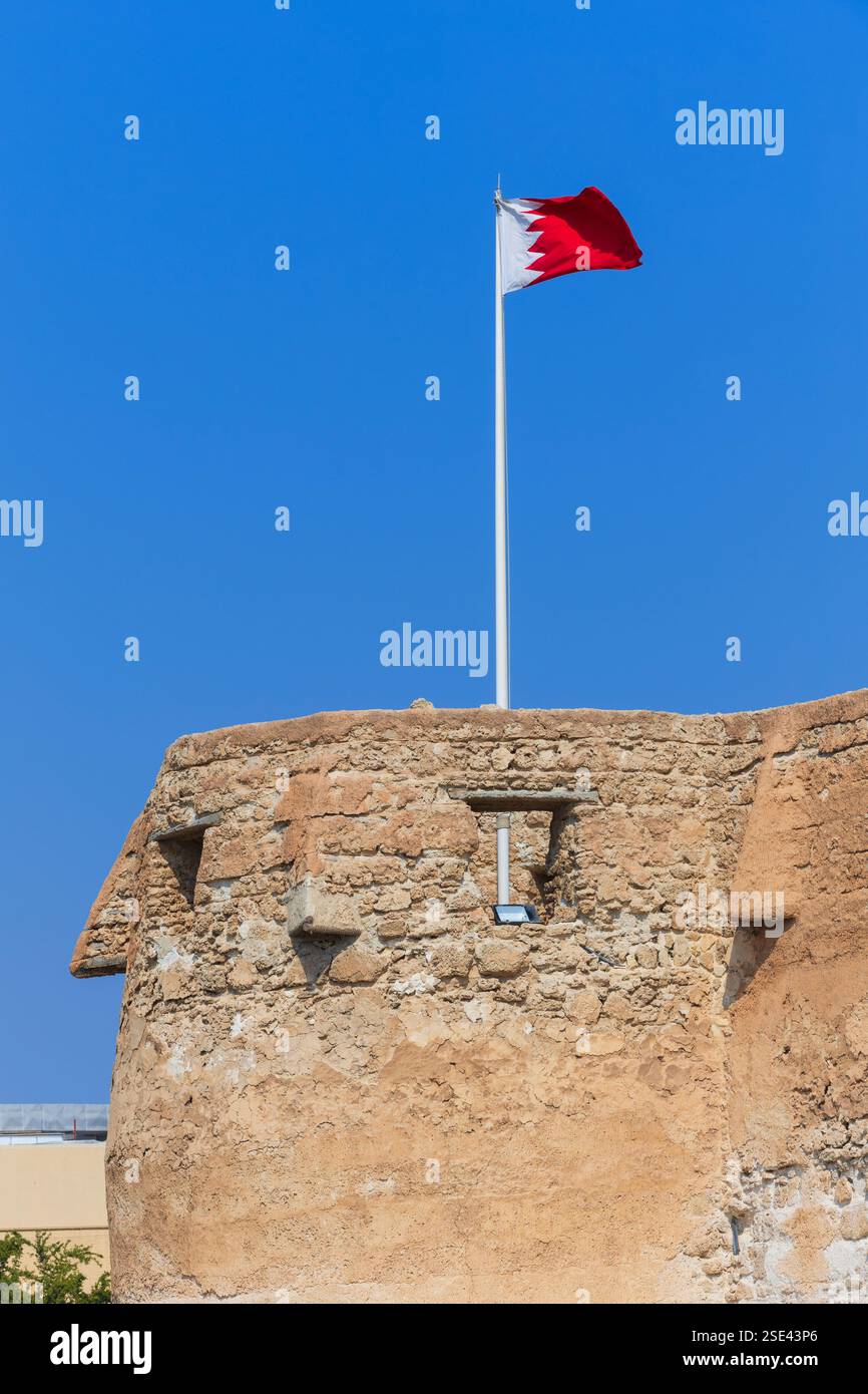The Bahraini flag flying proudly over 15th-century Arad Fort in Manama ...