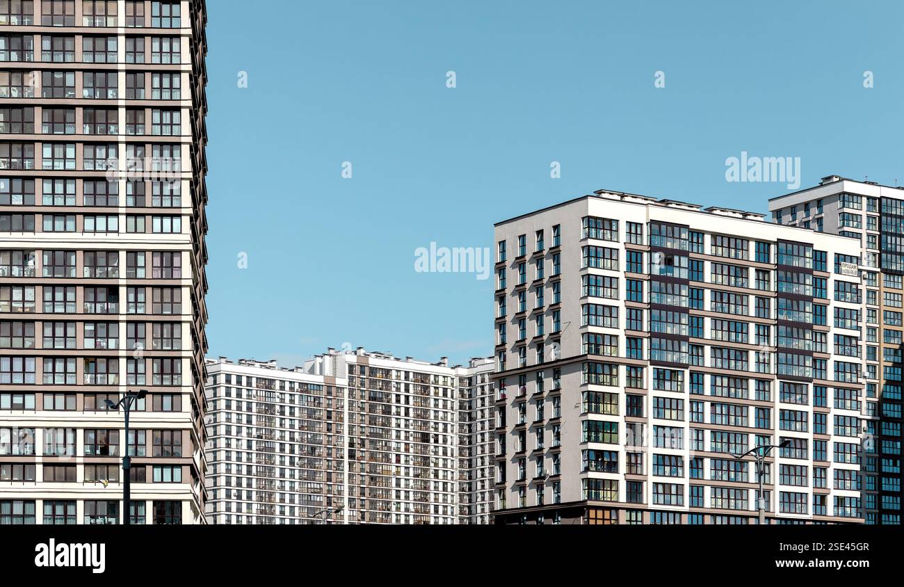 Modern high-rise building in an urban cityscape with glass facades ...