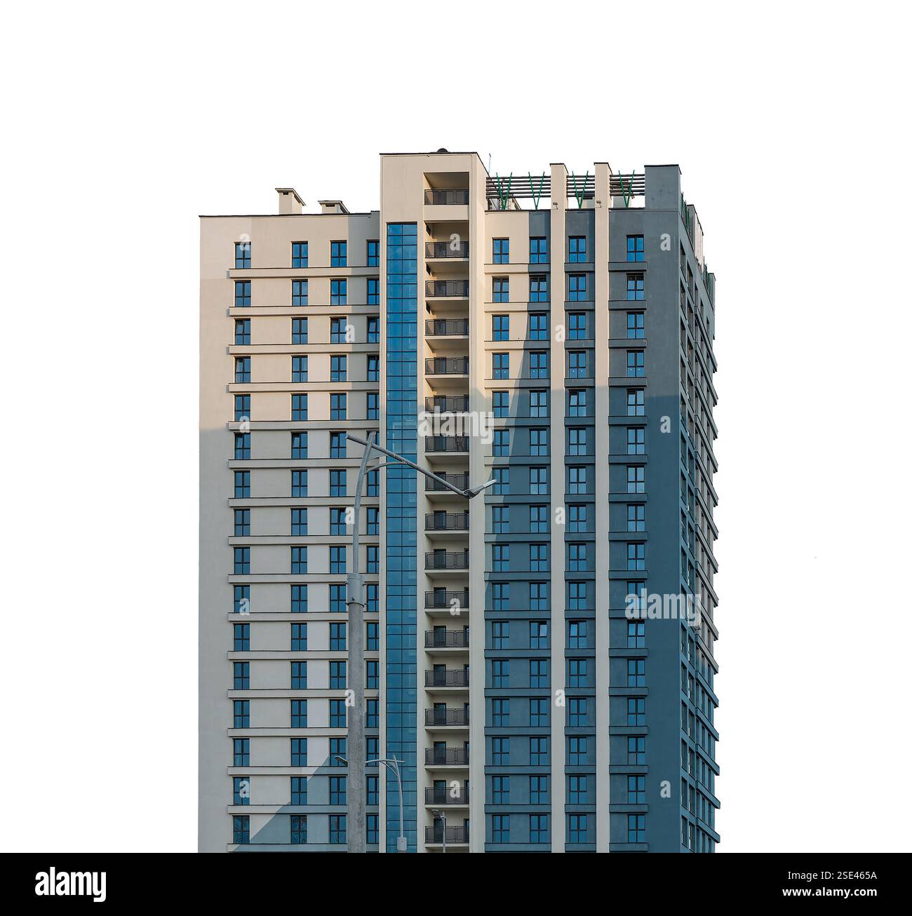 Modern high-rise residential building with balconies and glass windows ...