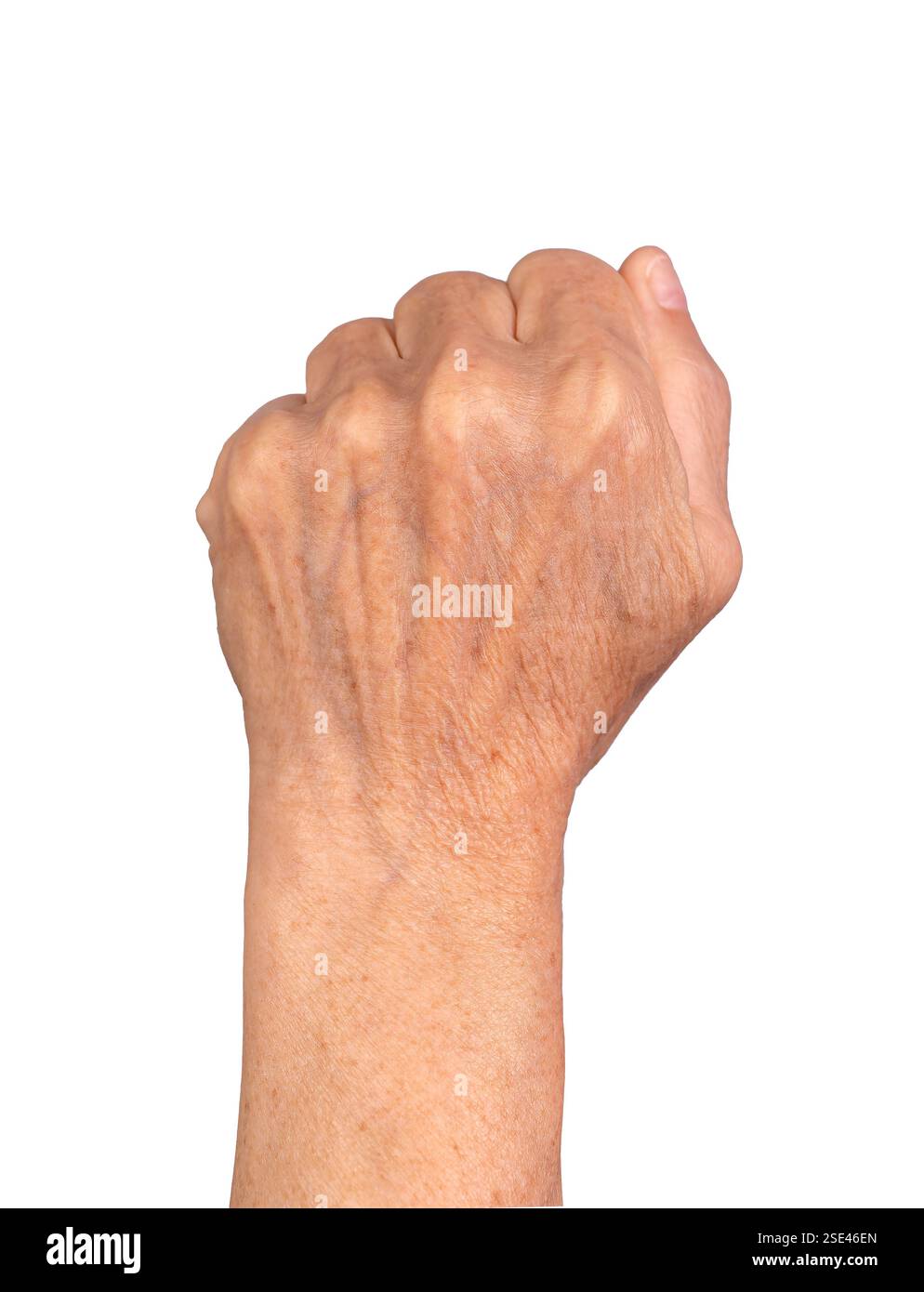 wrinkled hand clenched into a fist, symbol of strength, protest ...