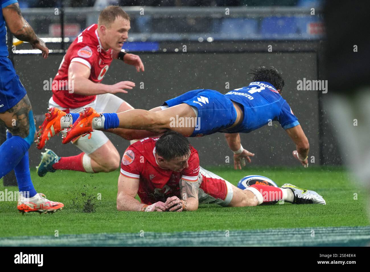 Rome, Italia. 08th Feb, 2025. try of Josh Adams of Wales and stop of ...