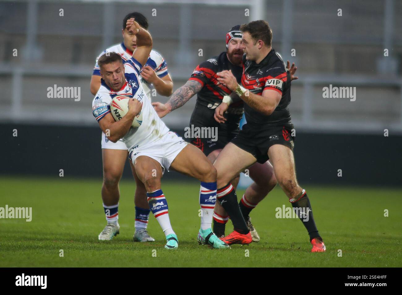 Goole, UK. 08th Feb, 2025. Matty Russell bounces off Thomas Minns ...