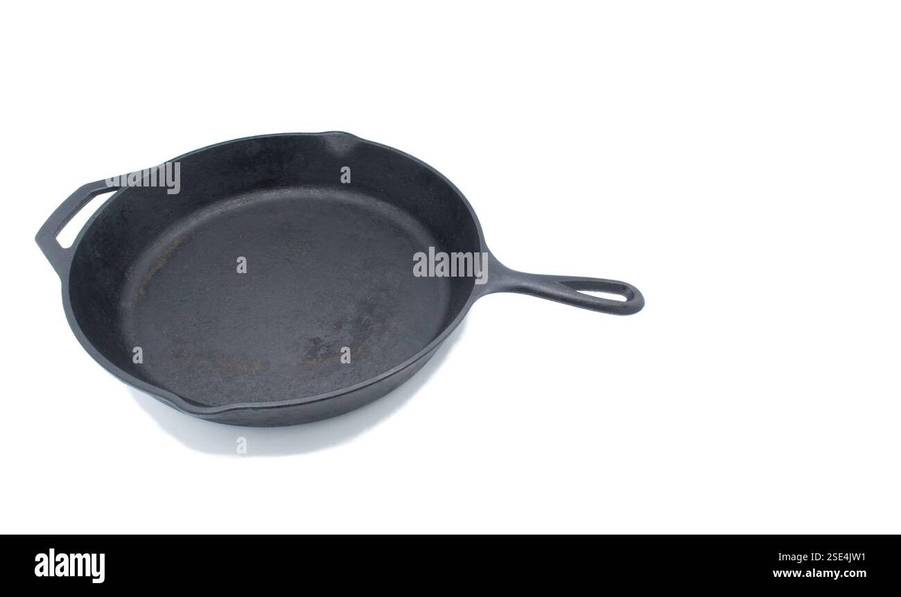 Heavy duty cookware skillet made of cast iron is valued for its heat ...