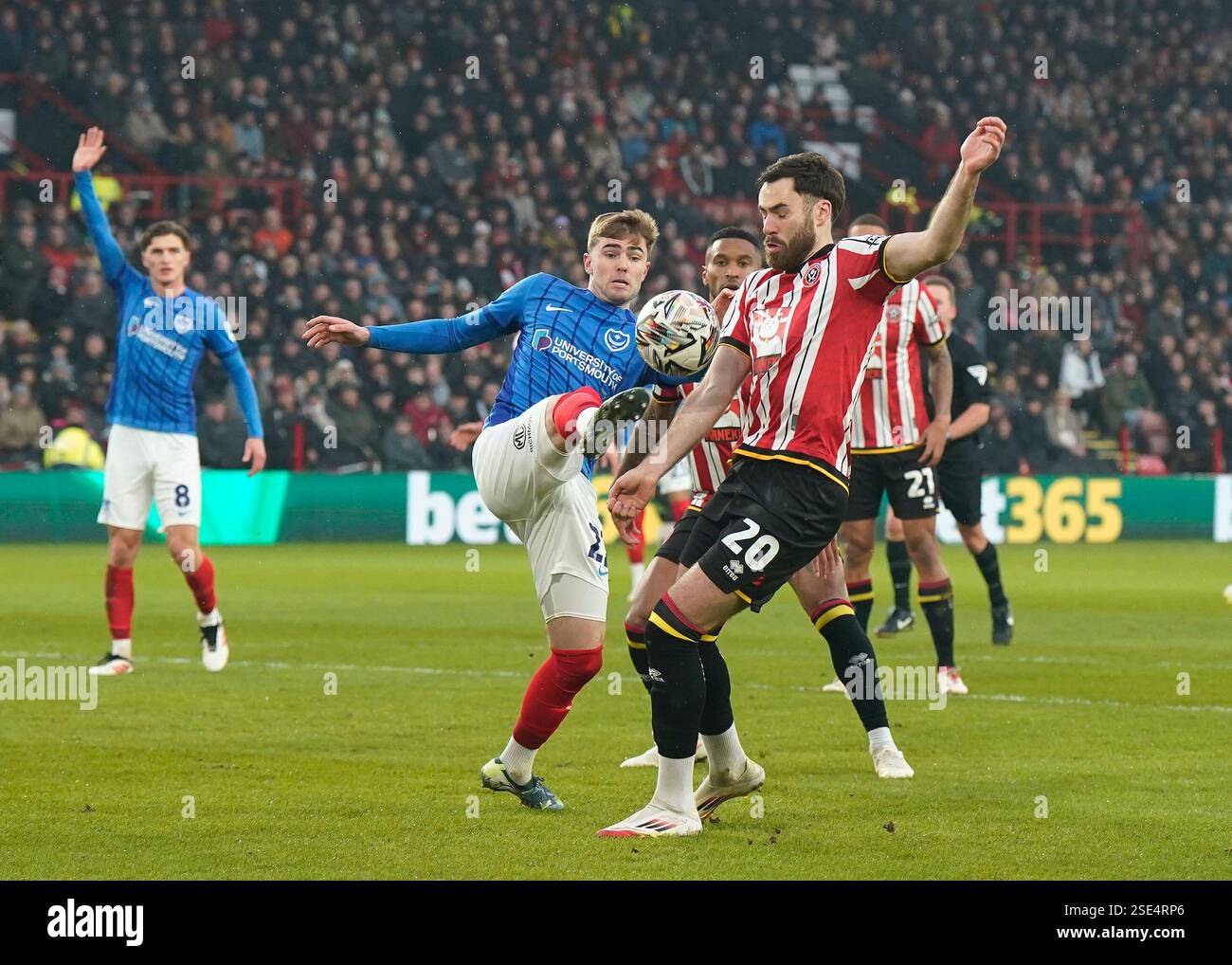 Sheffield, UK. 8th Feb, 2025. Zak Swanson of Portsmouth tackles Ben ...