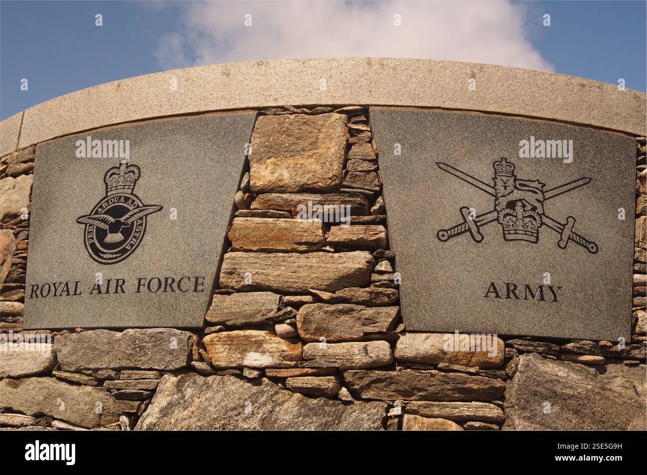 A modern, circular war memorial set in the village of Bragar, Isle of ...