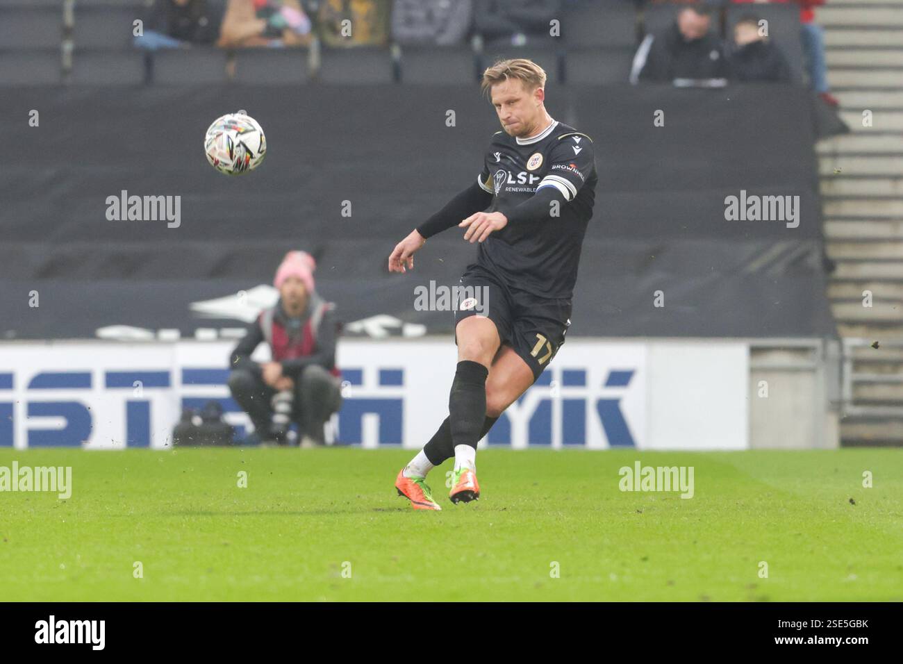 Milton Keynes on Saturday 8th February 2025. Bromley's captain Byron ...