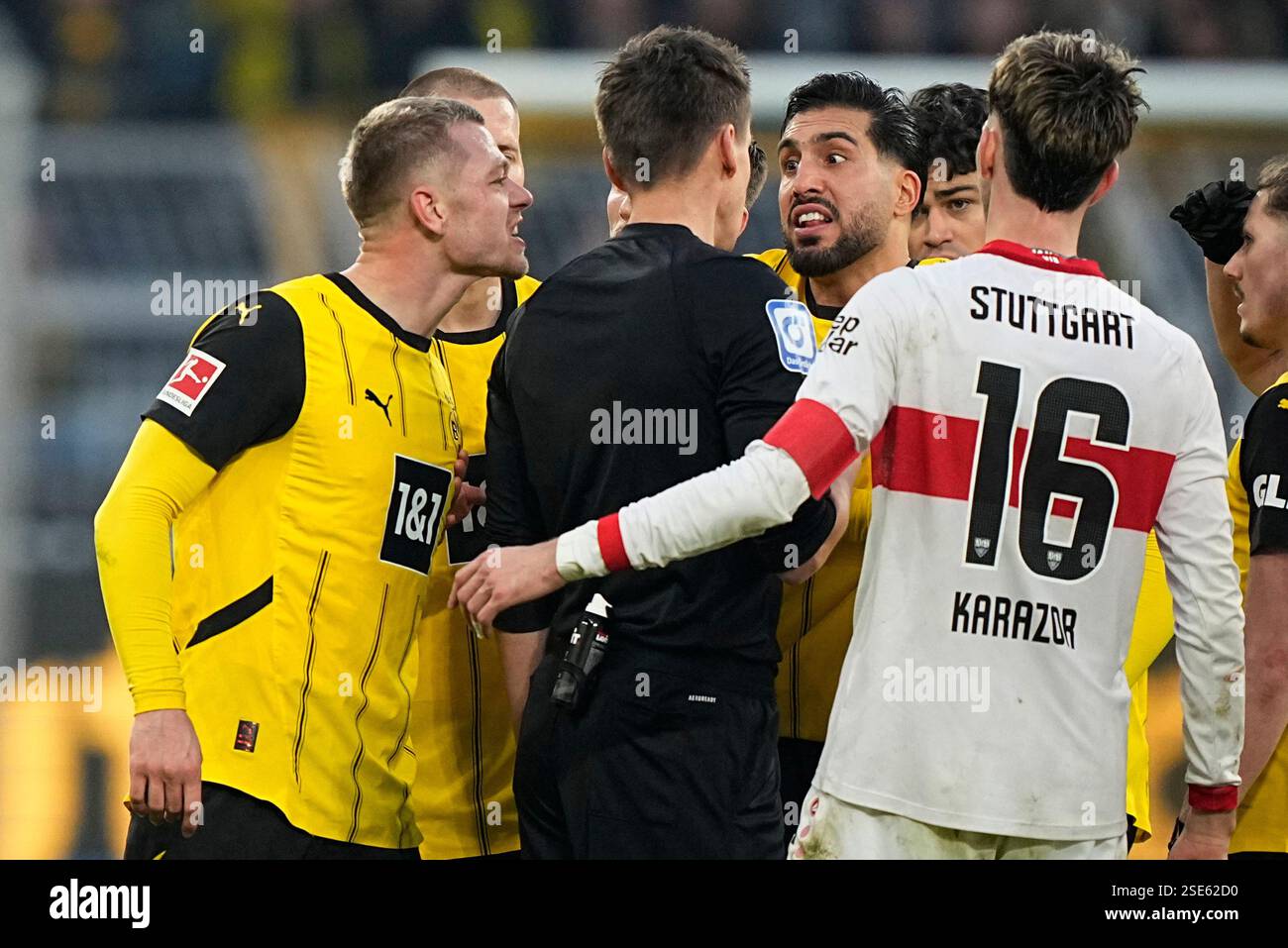 Dortmund's Julian Ryerson, receives a red card, left, and his teammate ...