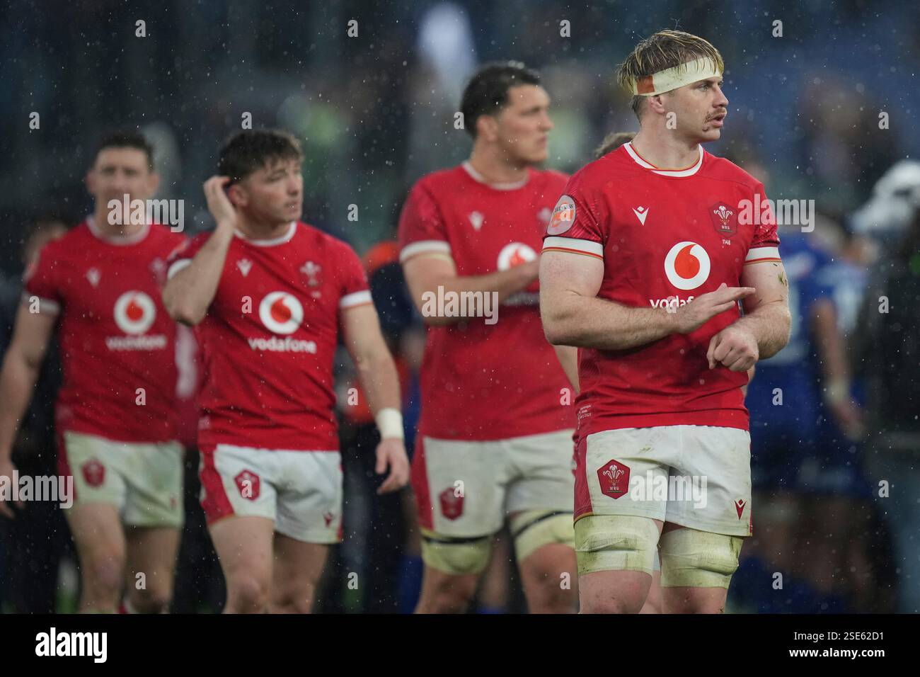 Wale's Aaron Wainwright, right, reacts at the end of the Six Nations ...