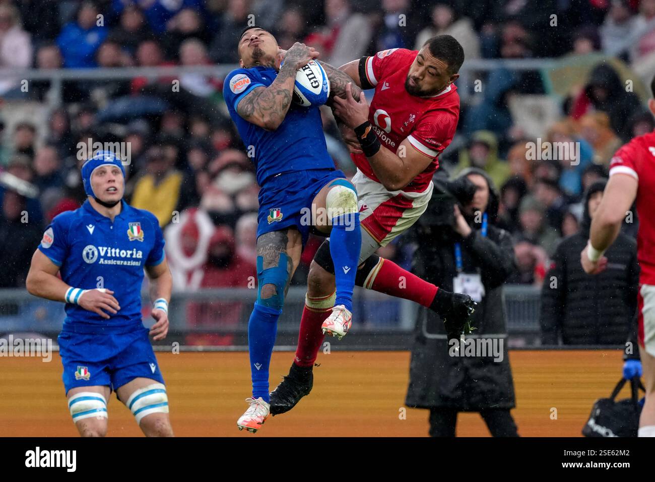 Rome, Italia. 08th Feb, 2025. Monty Ioane of Italy and Taulupe Faletau ...