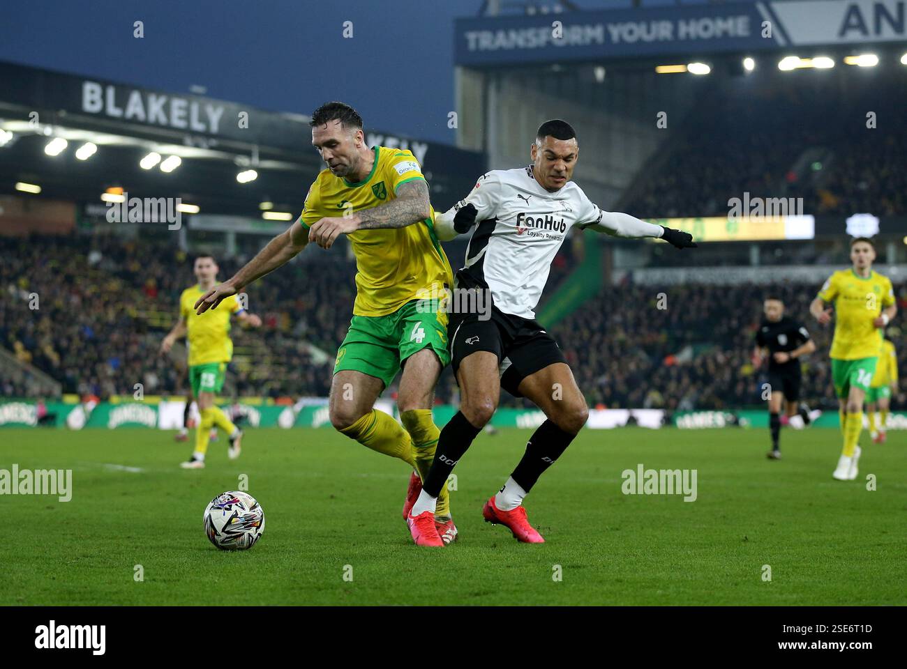 Norwich City's Shane Duffy (left) and Derby County's Kayden Jackson ...