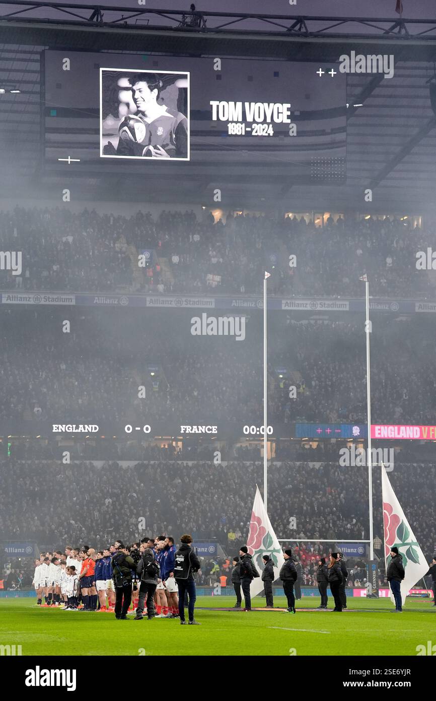 Players and fans stand in memory of former England Rugby player Tom ...
