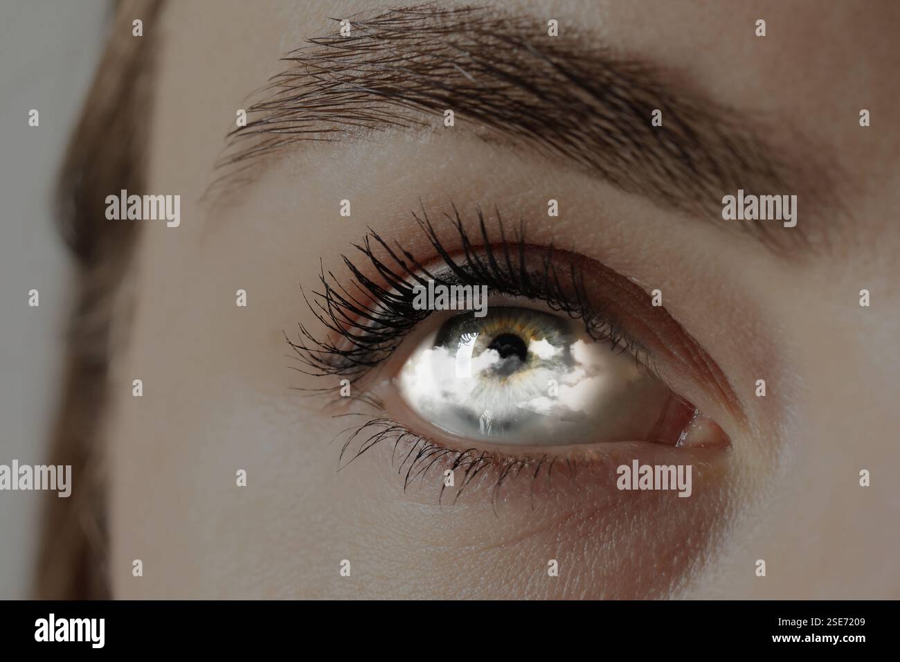 Hypnosis. Hypnotic cloud in woman's eye, closeup Stock Photo - Alamy