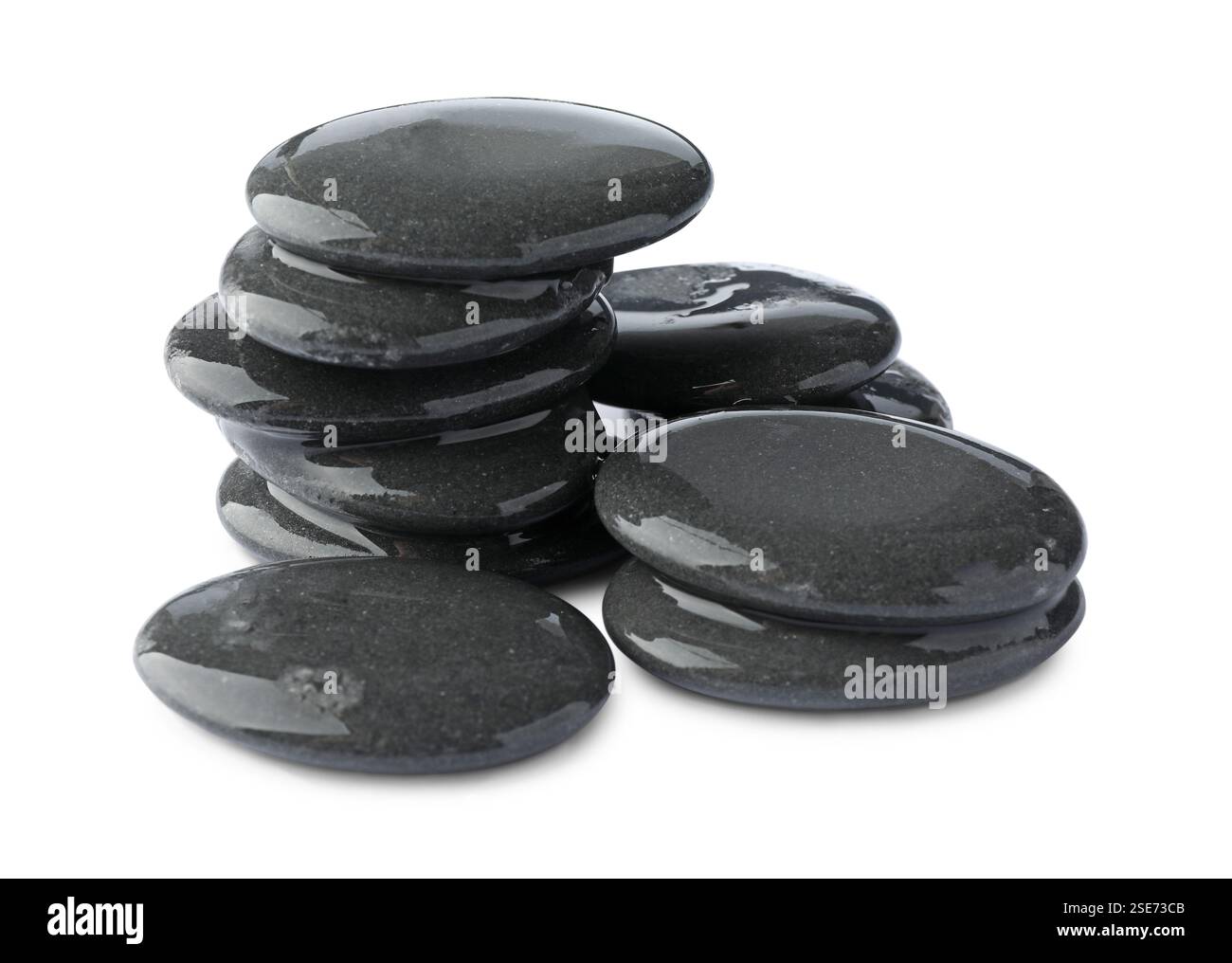 Stacked wet spa stones isolated on white Stock Photo - Alamy