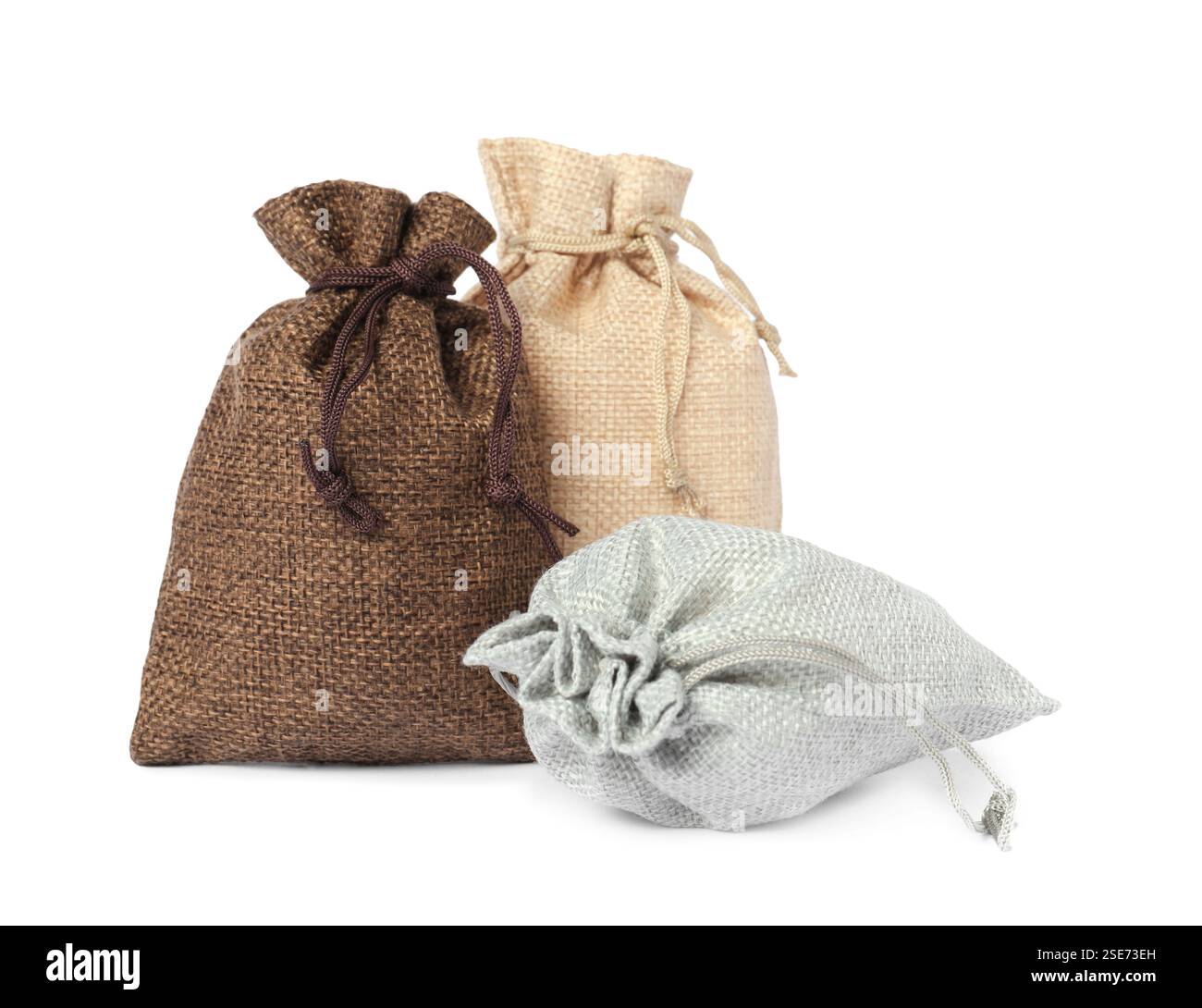 Three small burlap sacks isolated on white Stock Photo - Alamy
