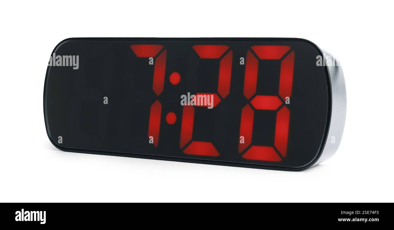 Digital alarm clock showing 7:28 o'clock on white background Stock ...