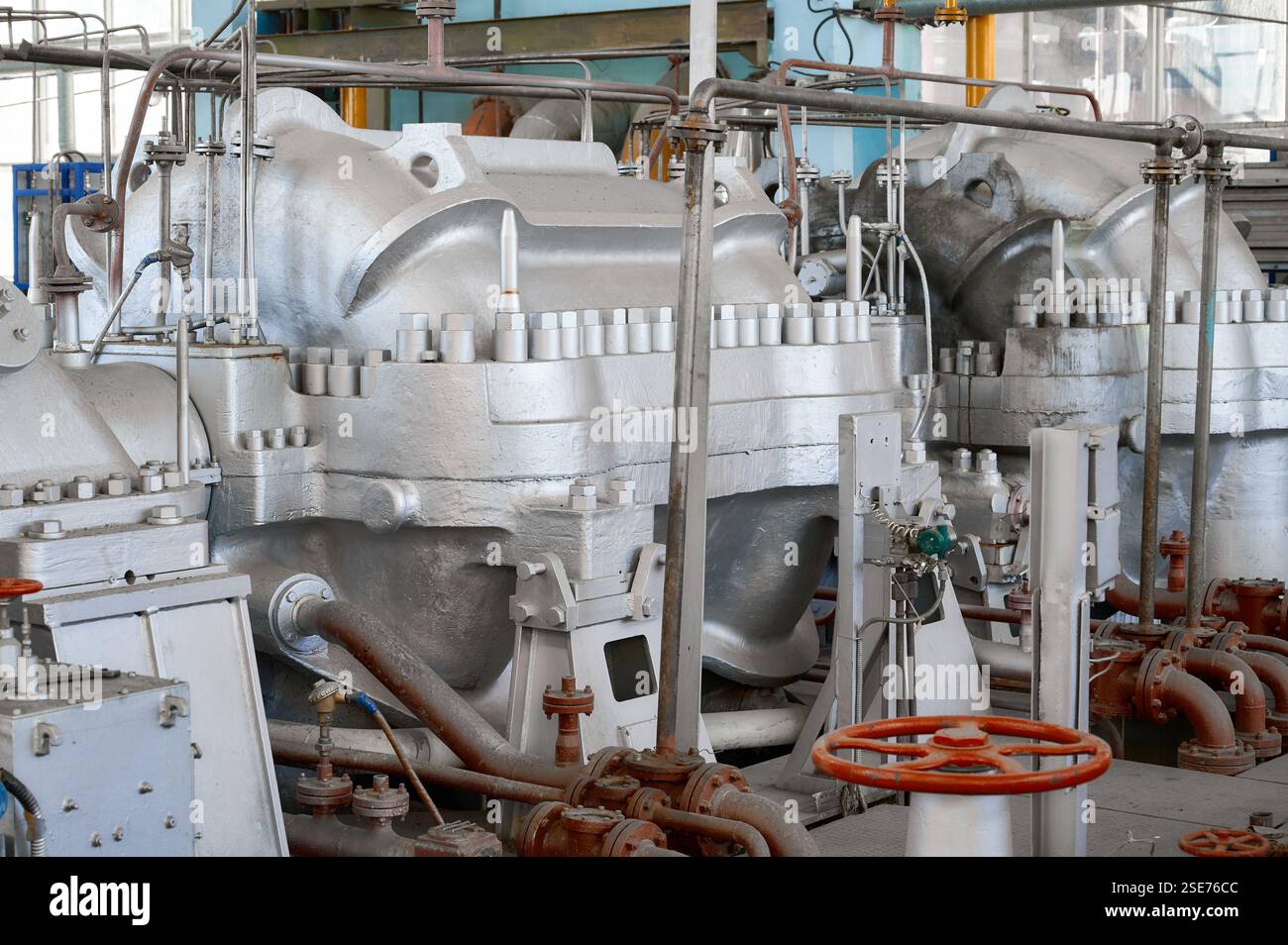 Powerful industrial pump operation at a chemical plant during the day ...