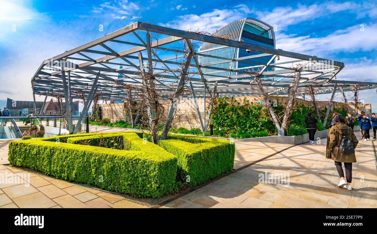 Great view of a block of perennial planting arranged under a metal ...