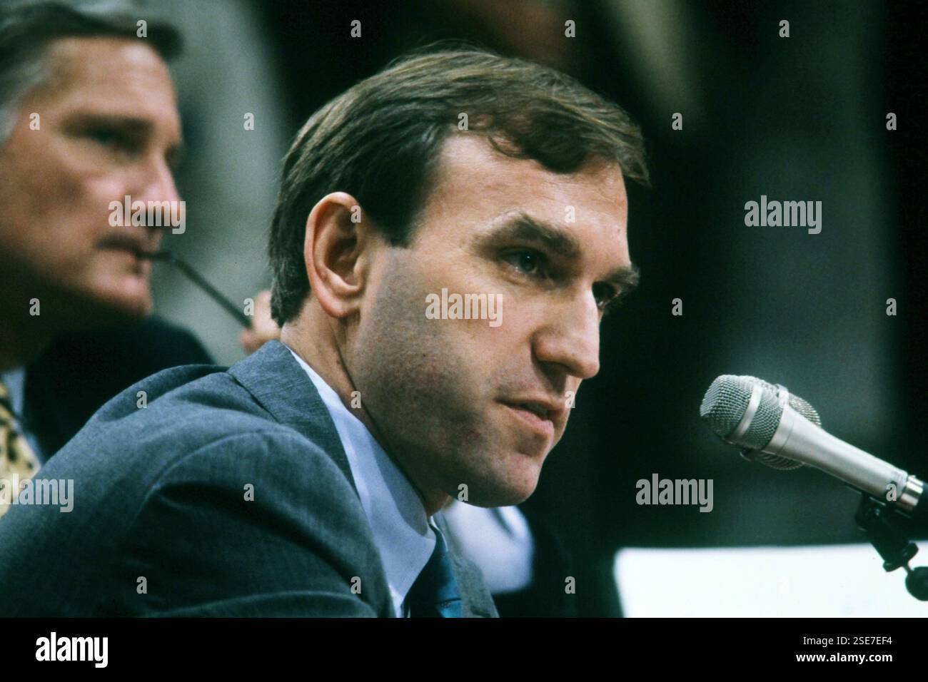 Elliott Abrams testifies at an Iranscam hearing. Photograph by Dennis ...