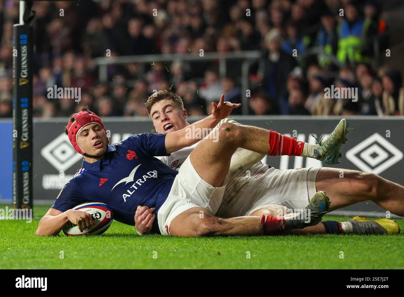 France's Louis Bielle-Biarrey, left, scores the opening try during the ...
