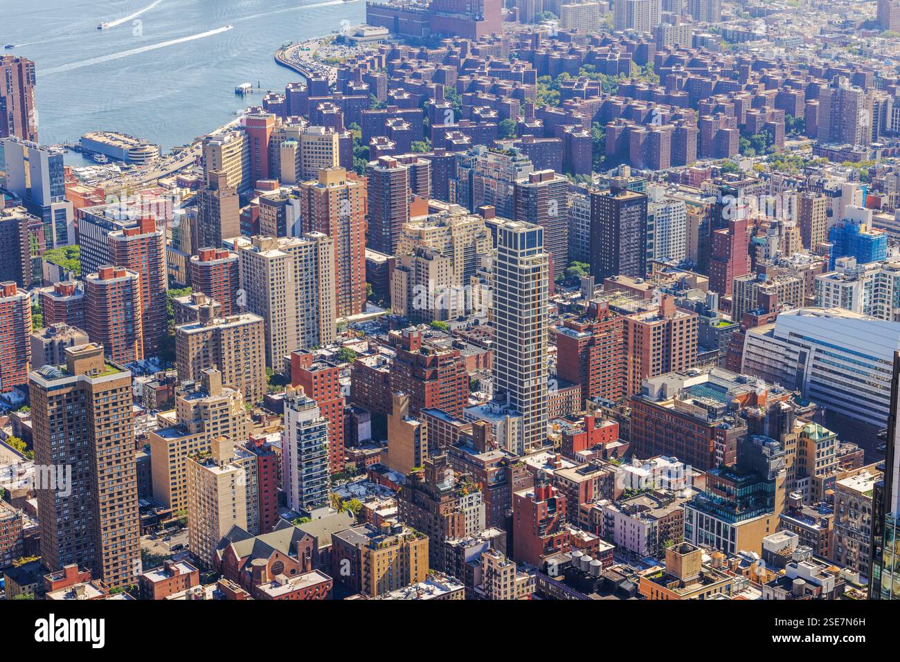 Aerial view of densely packed residential skyscrapers and streets near ...