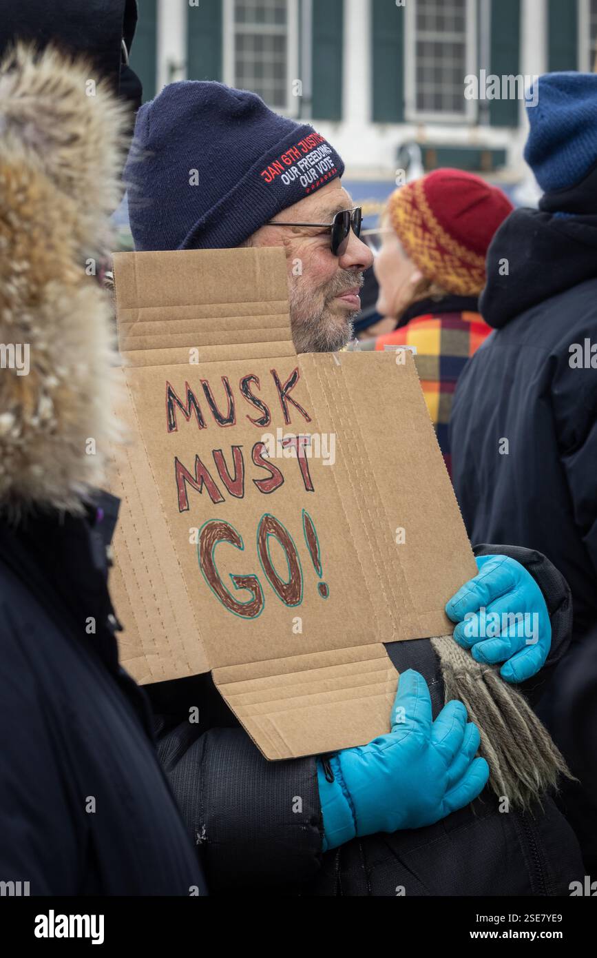 Activists gather in Northampton, Massachusetts, holding signs and ...