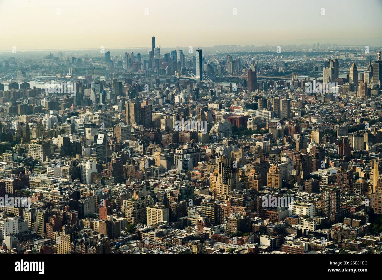 A panoramic view captures a sprawling urban landscape, showcasing ...