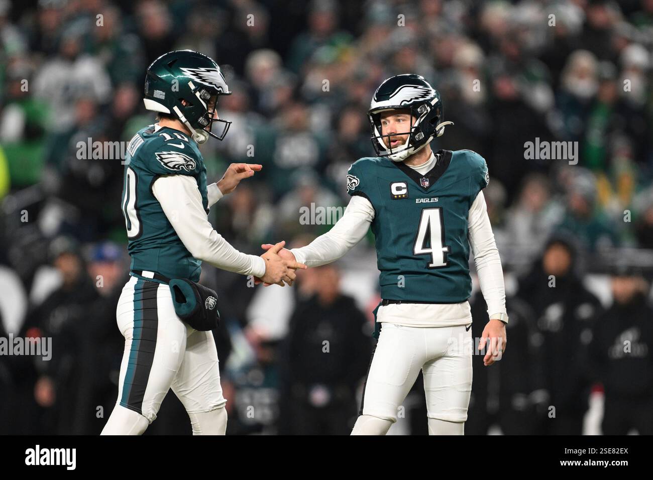 FILE - Philadelphia Eagles place kicker Jake Elliott (4) is greeted by ...