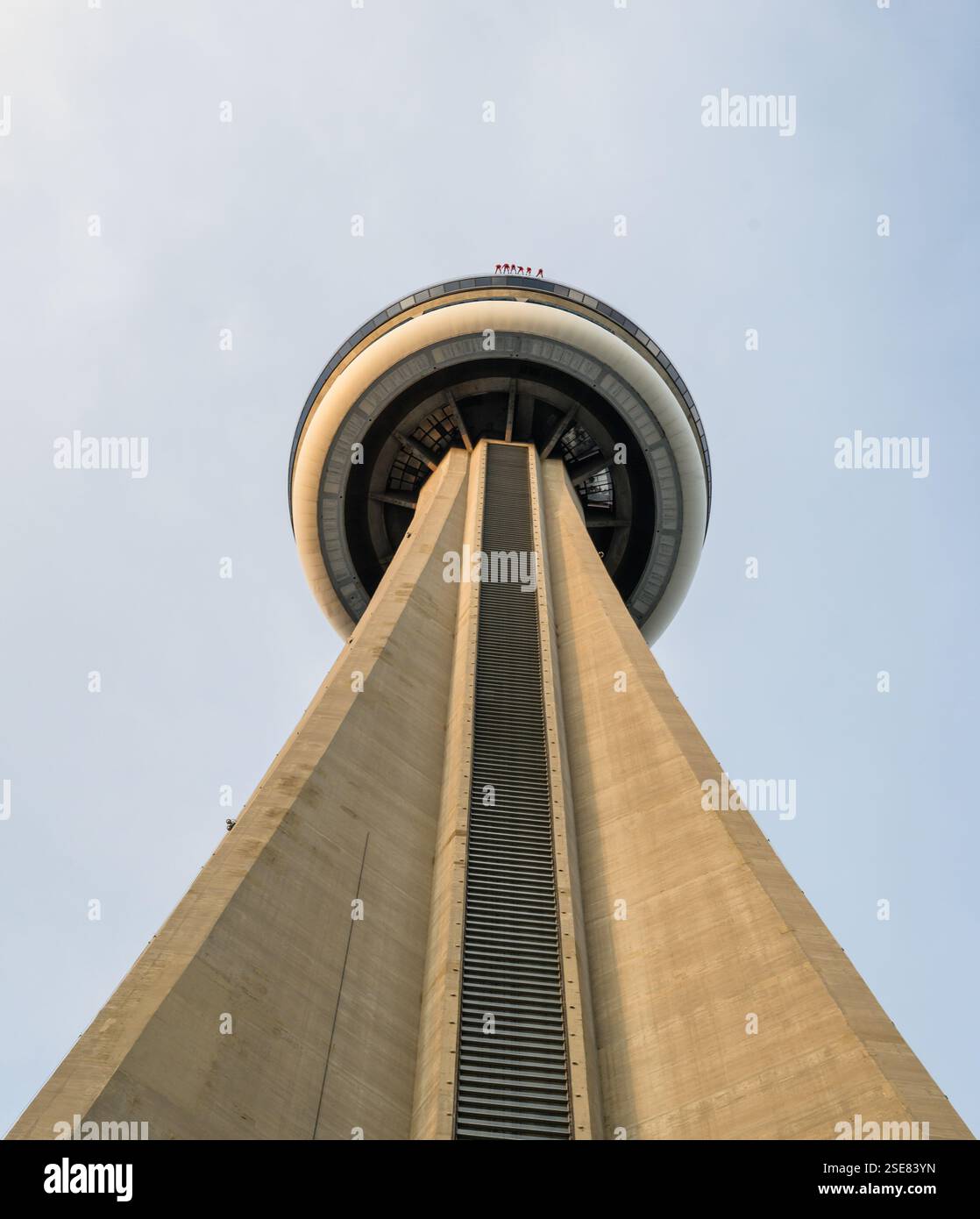 A towering concrete structure rises into the sky, showcasing an ...